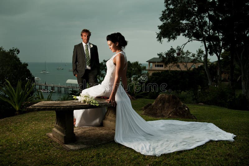 Bride Sitting with Dress Blowing in the Wind Stock Image - Image of ...