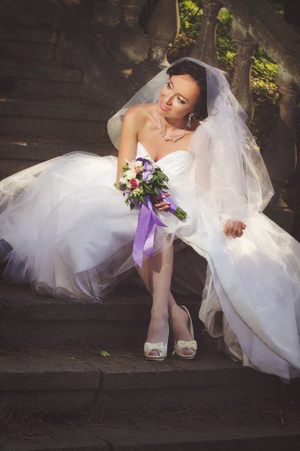 Bride and Groom Sitting on the Stairs Stock Photo - Image of caucasian ...