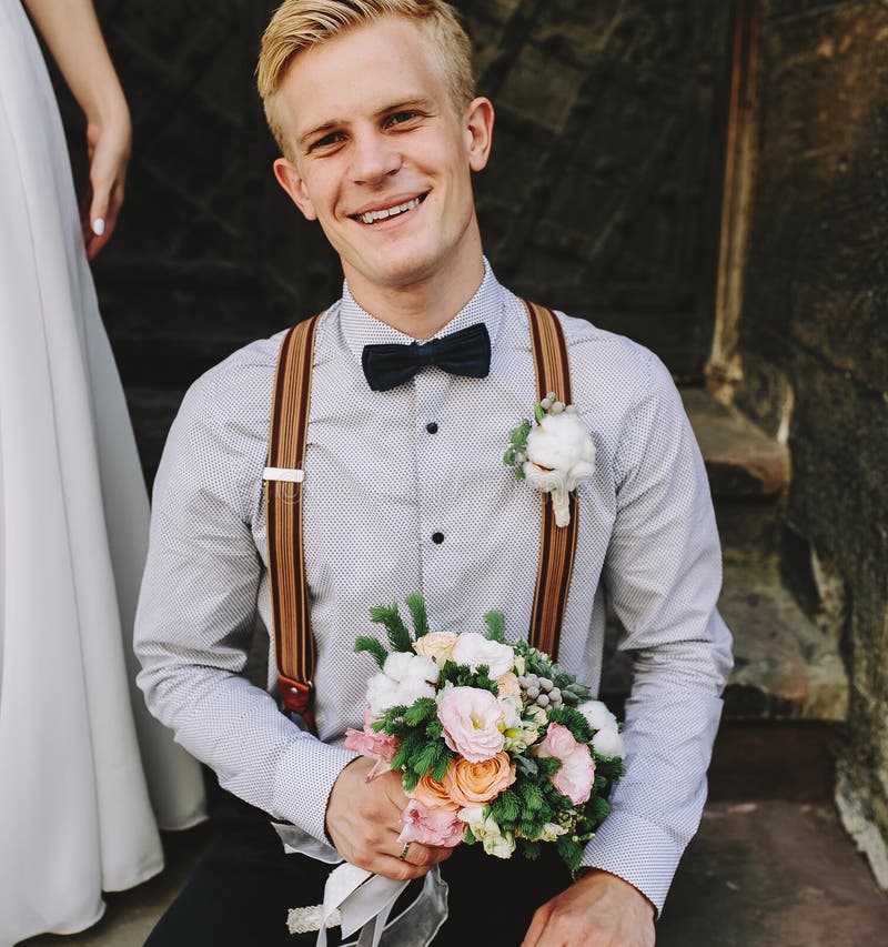 Bride Sitting on Stone Steps Stock Photo - Image of groom, expressing ...