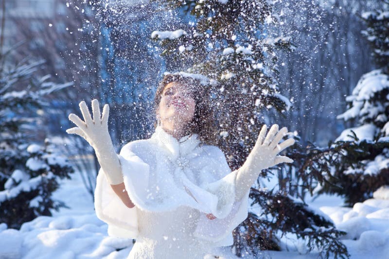 Bride on the snow stock image. Image of river, tree, smile - 37891841