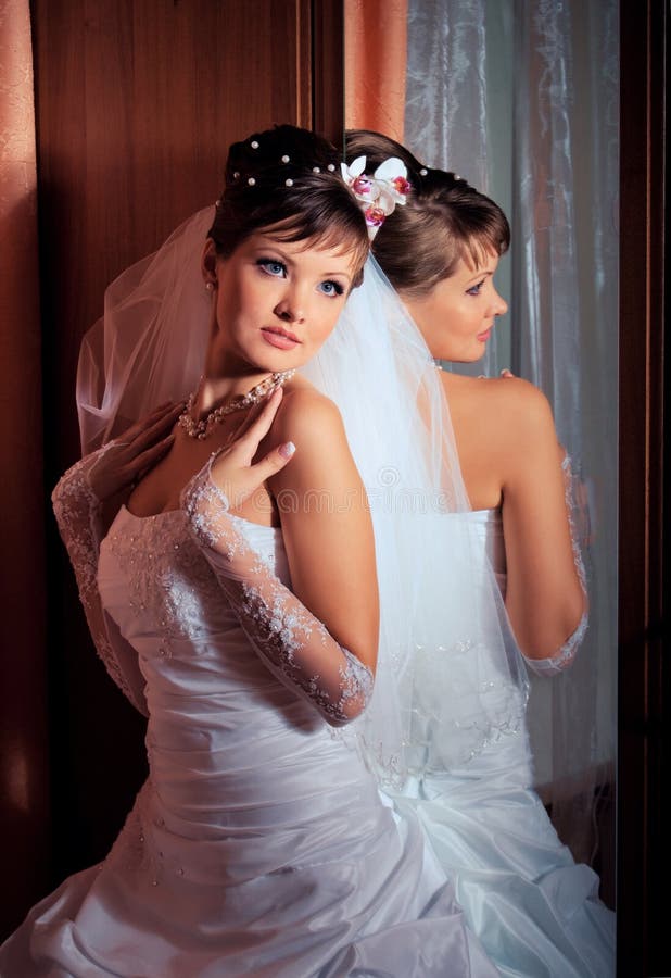 Bride Standing Next To the Mirror Stock Image - Image of ring, bride ...