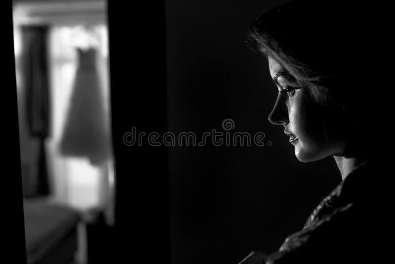 Bride Stands Thoughtfully in the Dark Room Stock Image - Image of ...