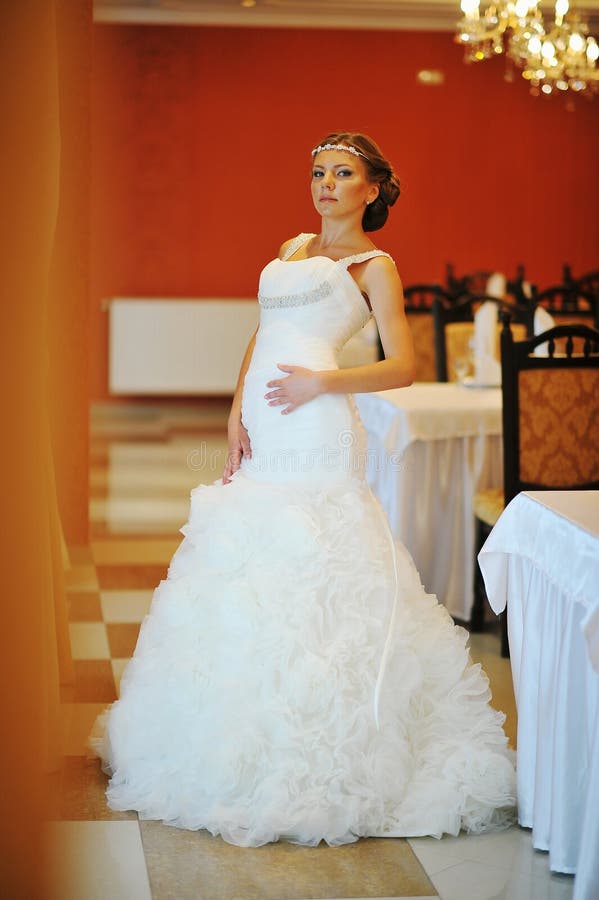 Bride with Tiara Pose at the Restauraunt. Stock Photo - Image of hall ...