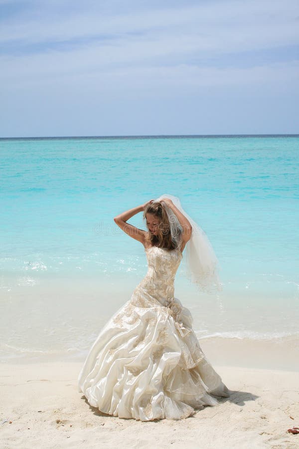 Bride on tropical beach stock photo. Image of marriage - 19290452