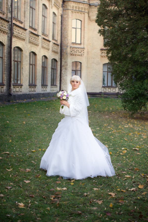 Bride Walking on the Wedding Day Stock Image - Image of outside, grass ...