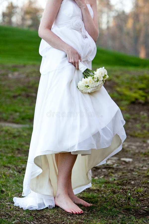 Bride Wearing No Shoes in the Mud Stock Image - Image of bouquet, lawn ...