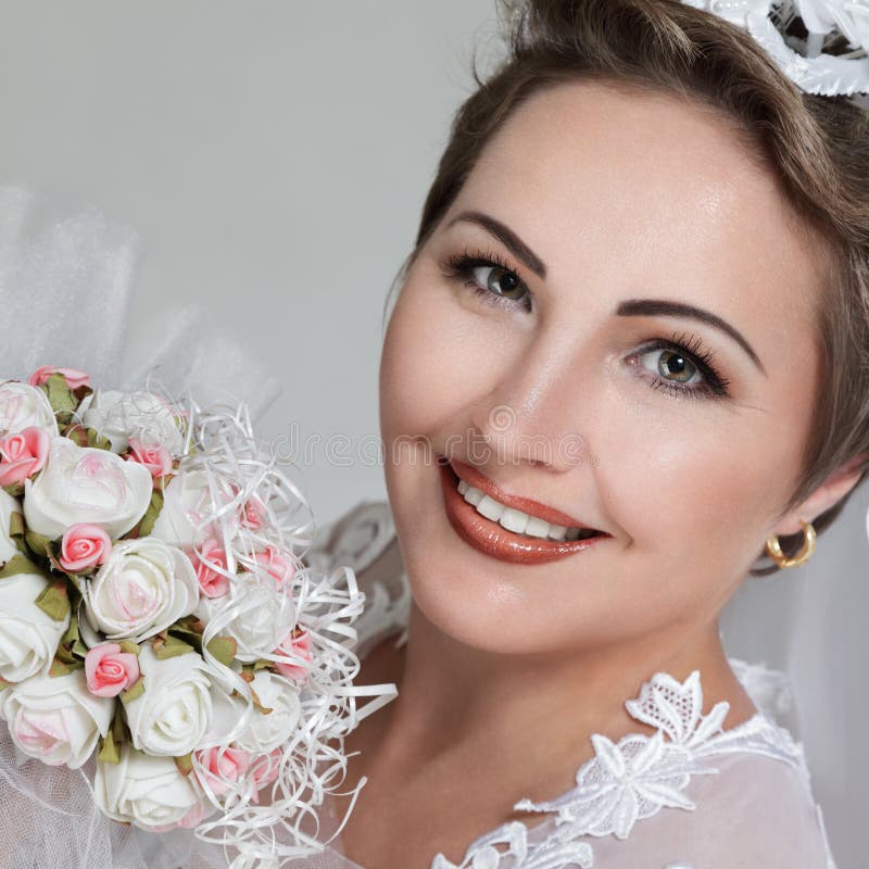 Bride with wedding bouquet stock photo. Image of fiancee - 26415902