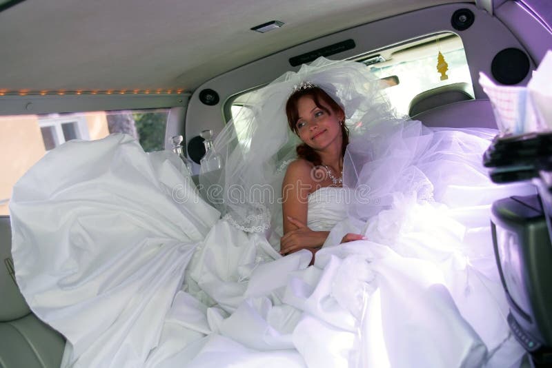 Bride in Wedding Car stock image. Image of outdoors, peeping - 4085609