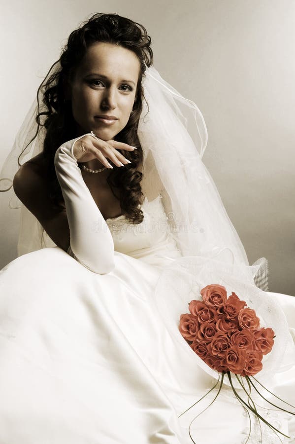 Bride in Wedding Dress with Bunch of Roses Stock Photo - Image of ...