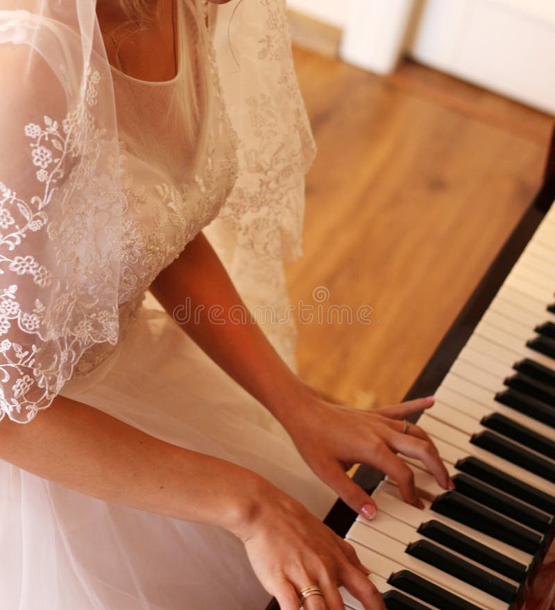 Bride playing the piano stock image. Image of girl, love - 113353777