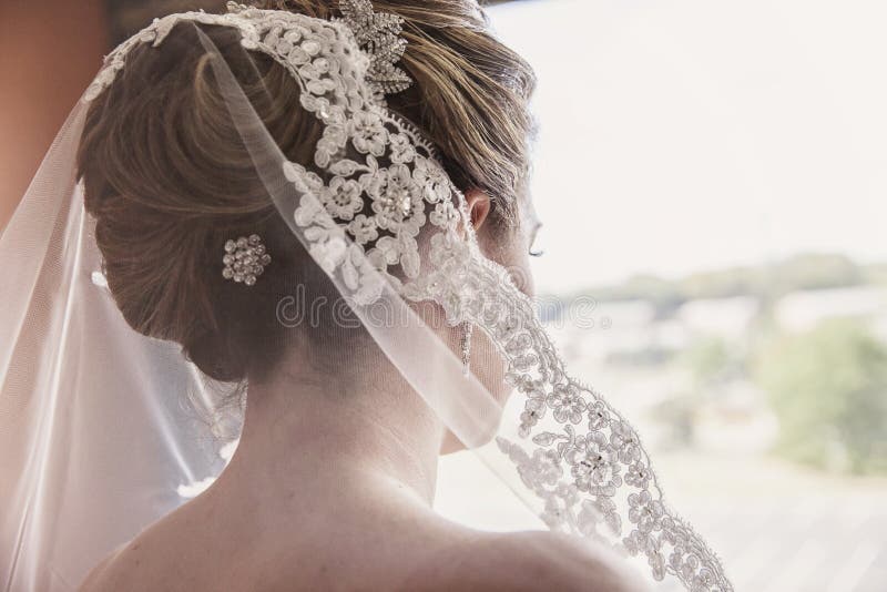 Profile of Bride Holding Bouquet Stock Photo - Image of wedding, roses ...