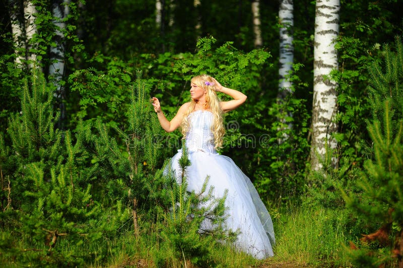 The bride in wood stock photo. Image of bride, blonde - 14957738