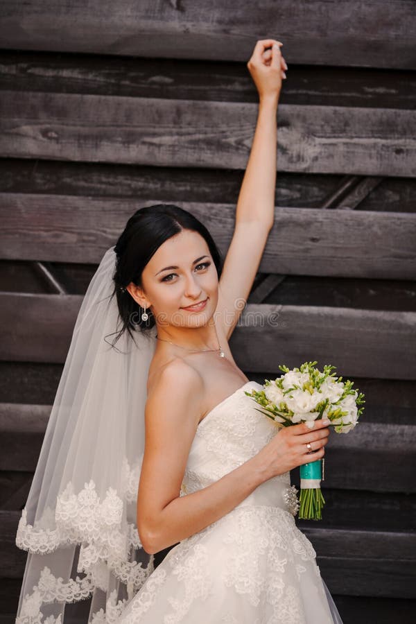 Bride at wooden wall stock photo. Image of happy, fashion - 53305664