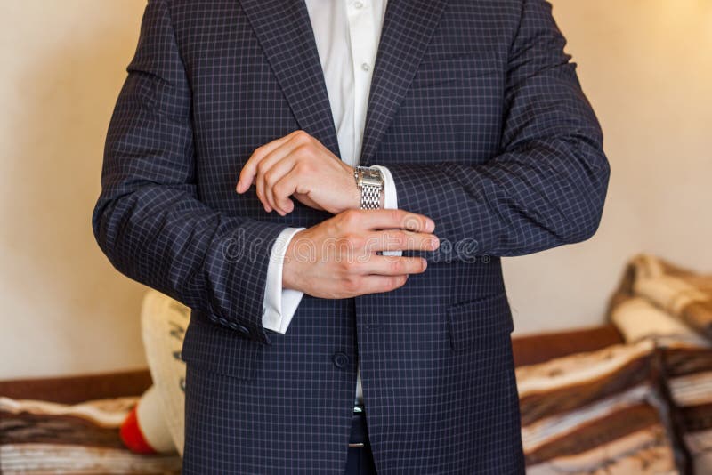Bridegroom Wearing Suit and Buttoning Cuffs Stock Photo - Image of ...