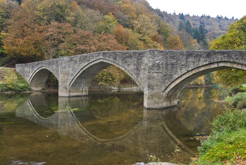 Bridge across a river stock image. Image of stream, seaweed - 3713893