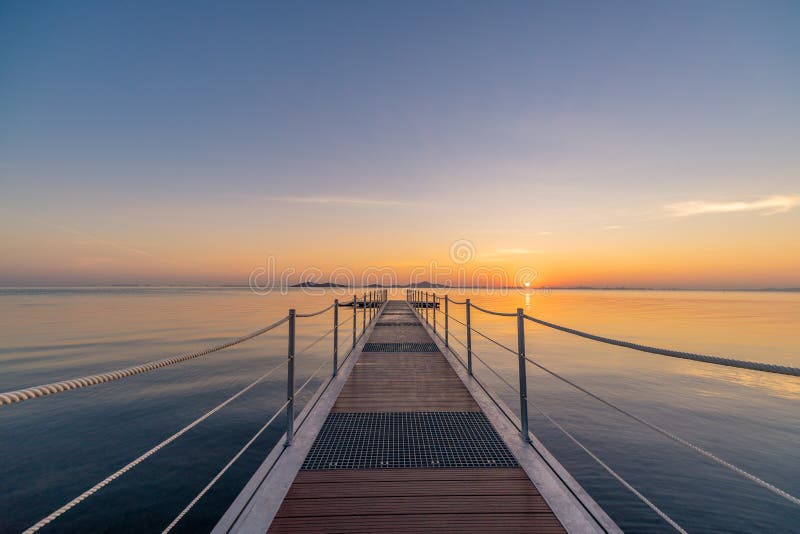 Bridge at beach II stock photo. Image of dusk, sunlight - 199575210