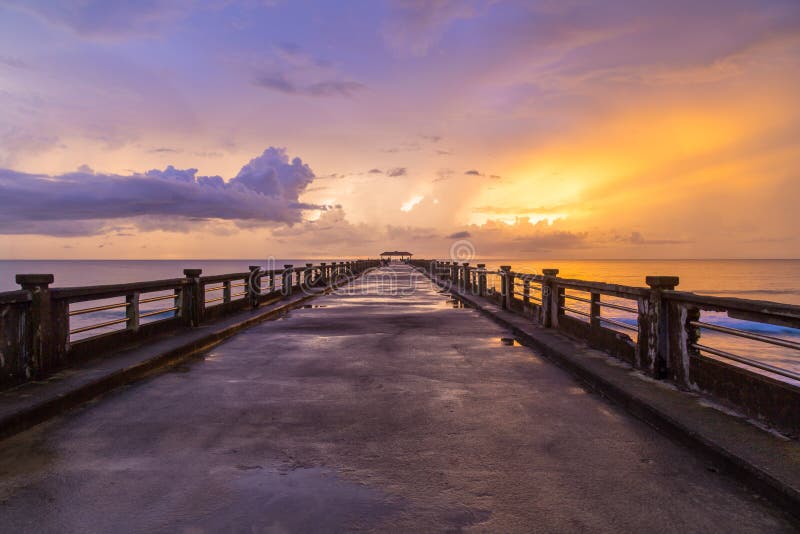 Bridge on Beach in Sunset and Sea Wave Stock Image - Image of pier ...
