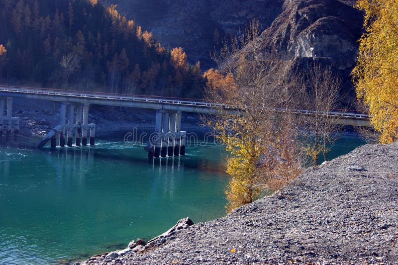 Bridge through Beautiful River in Mountain Siberia Stock Image - Image ...