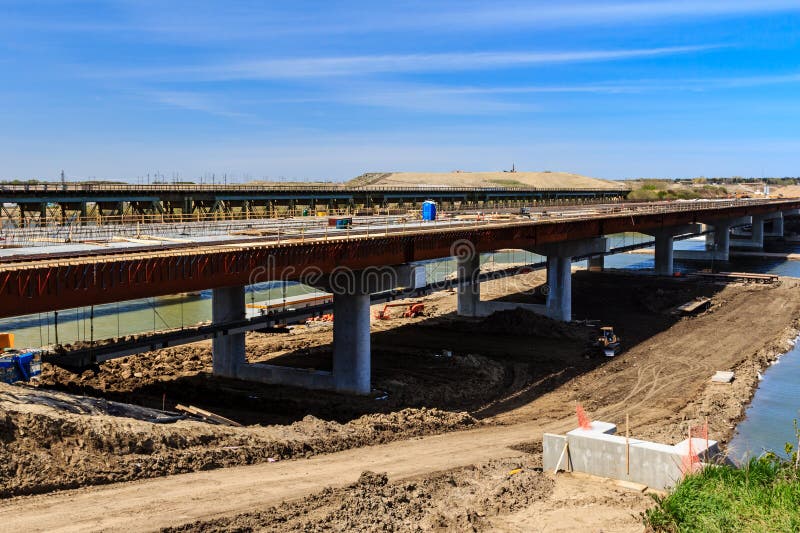 A Bridge is Being Built Over a River Stock Image - Image of ...