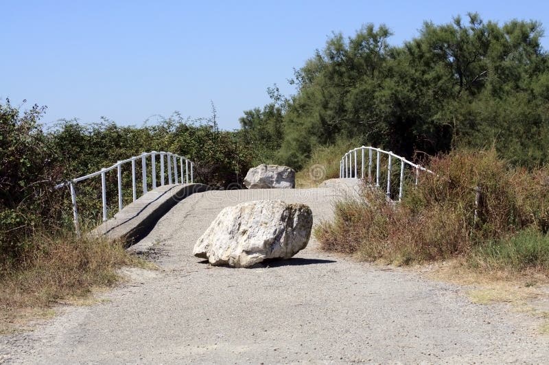 Bridge blocked by rocks stock image. Image of stone, rural - 10501613