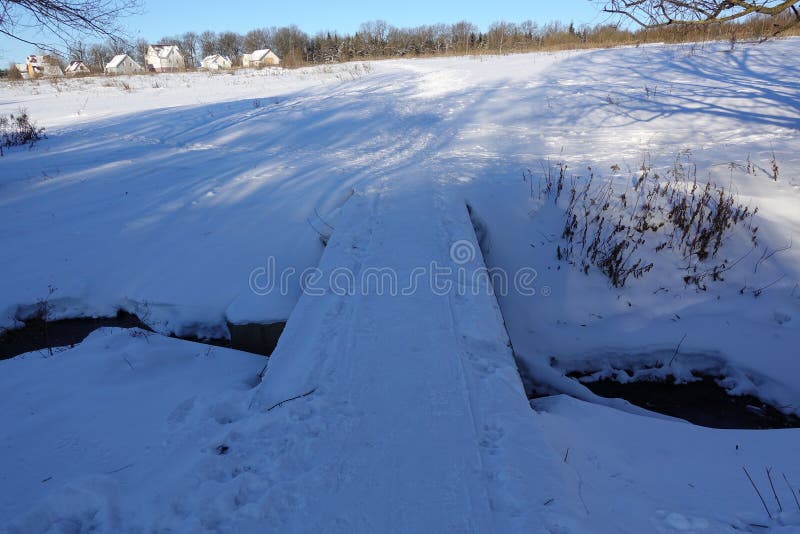 Bridge and a Brook, Creek Surrounded of Deep Snow Stock Photo - Image ...