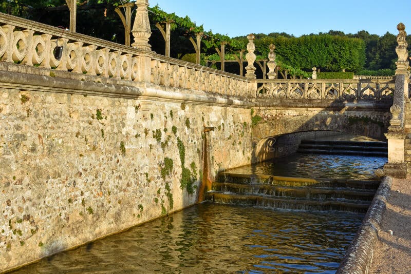 Bridge and Chanel Cascade in a Formal Garden Stock Image - Image of ...