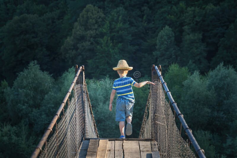 On the Bridge, the Child Goes Forward into the Unknown (concept: Life ...