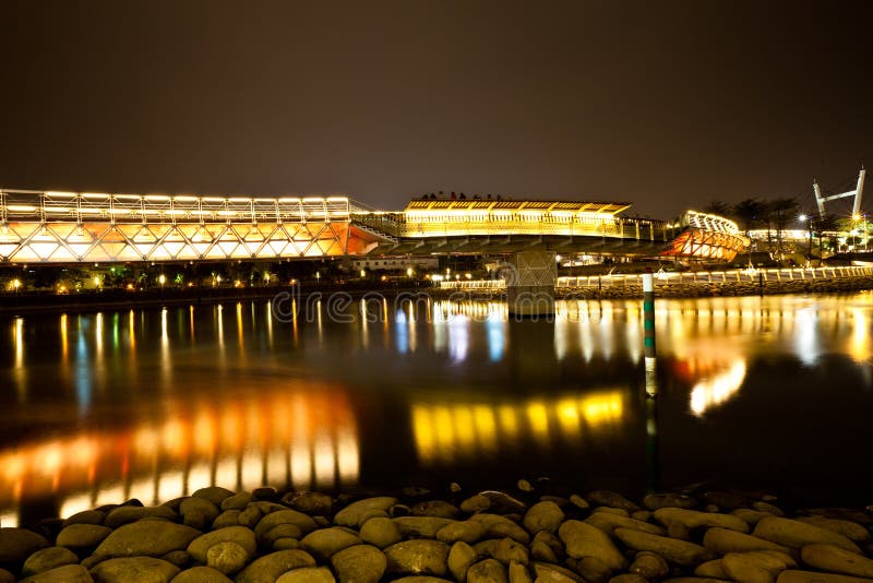 Bridge and city at night stock photo. Image of landmark - 13120944