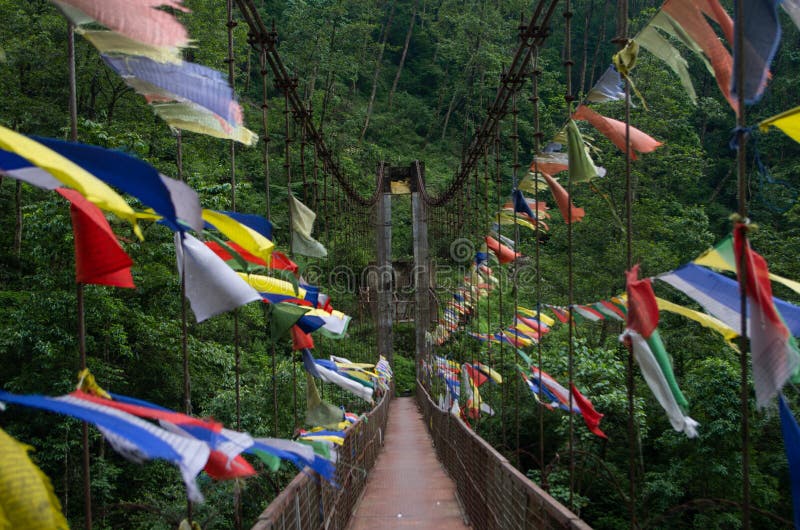 The Bridge of Colourful Flags Stock Image - Image of shrine, flower ...