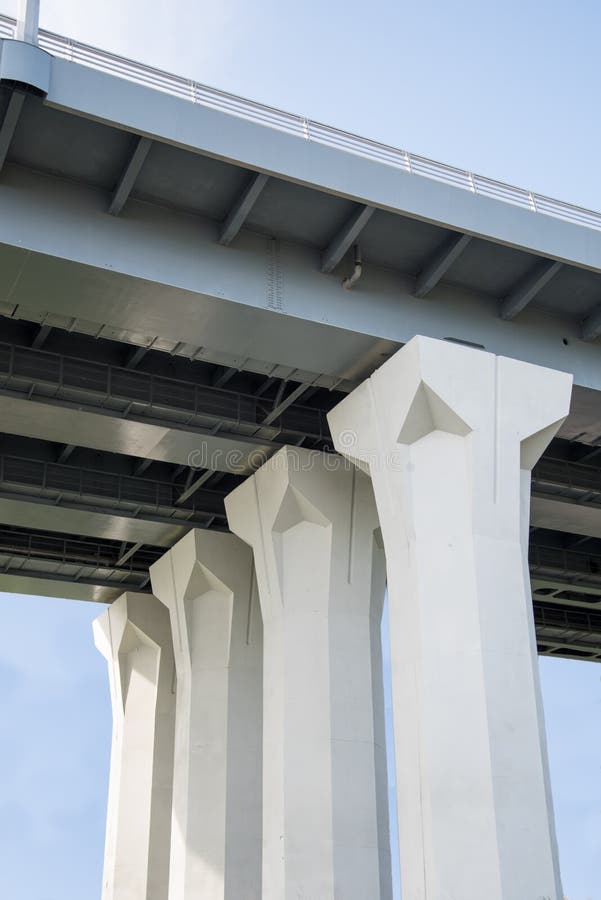 Bridge columns in the sky stock image. Image of traffic - 74913479