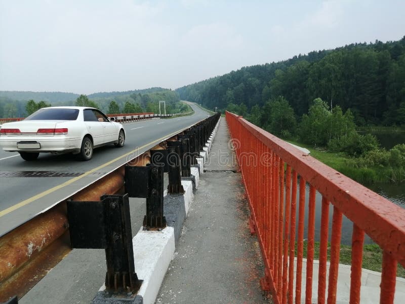 The Bridge Connecting the Two Banks of the River Stock Image - Image of ...