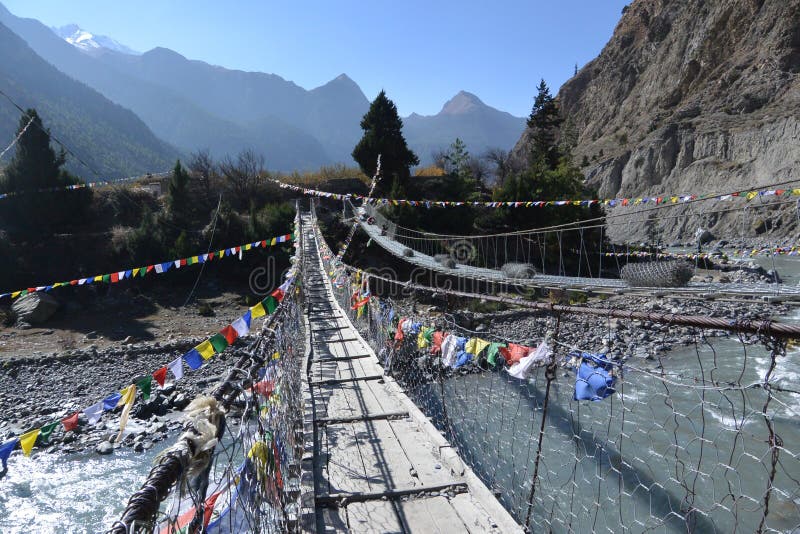 The Bridge Cross Over the River with Prayer Flag Row Stock Image ...