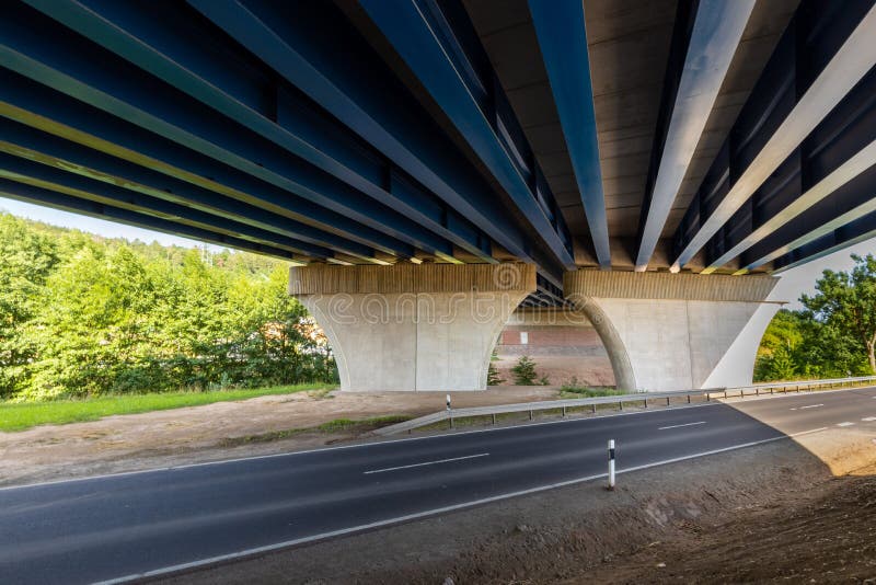 Bridge is crossing a road stock photo. Image of highway - 154335530