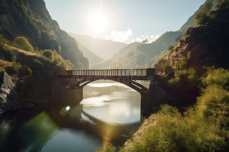 A Bridge that Cuts Across a Valley, with the Sun Shining on the Water ...