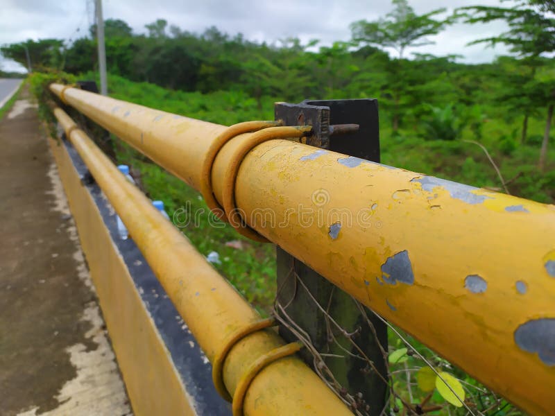 Bridge Fence on the Side of the Highway Stock Image - Image of yellow ...