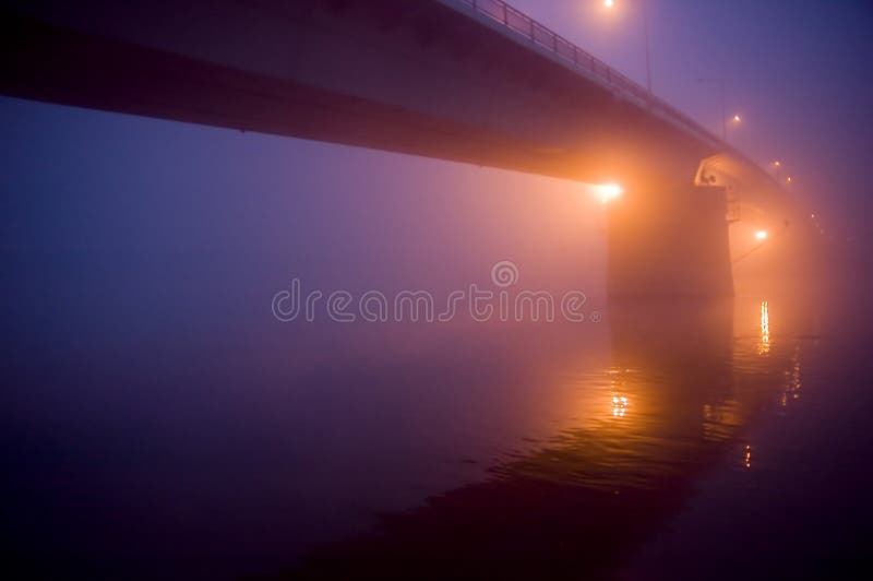 Bridge in the fog by night stock photo. Image of fall - 3964840