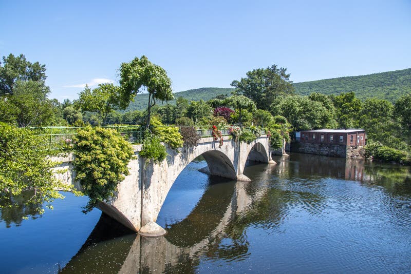Bridge Full of Flowers Going Over a River Stock Photo - Image of nature ...