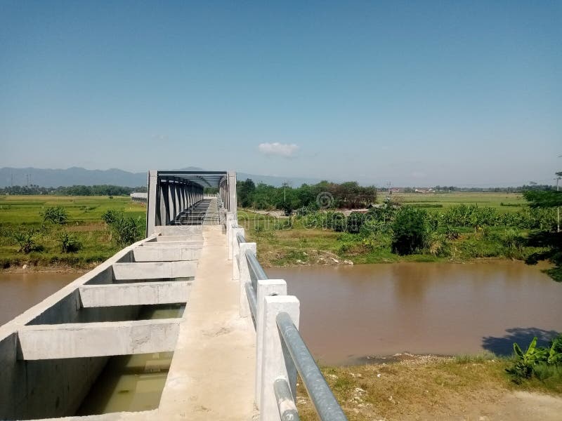 A Bridge that Functions As a Water Channel for Agricultural Irrigation ...