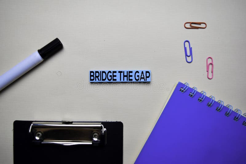Bridge the Gap Text on Sticky Notes with Office Desk Concept Stock ...