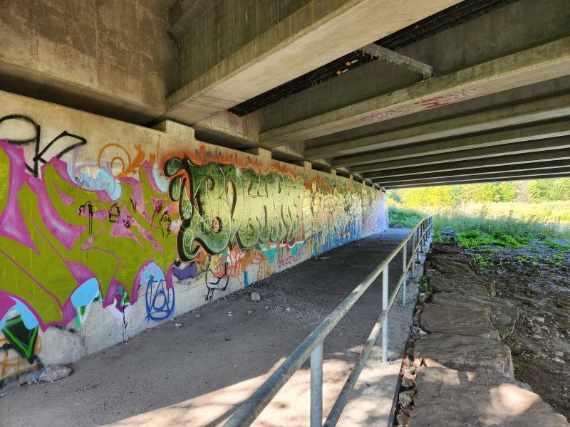 Bridge Graffiti Wall Art editorial stock image. Image of vehicle ...