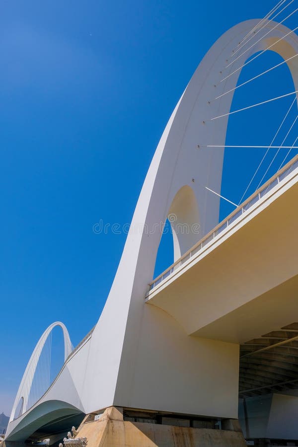 The Bridge Has Two Arches on One Side and Three Columns on the Other ...