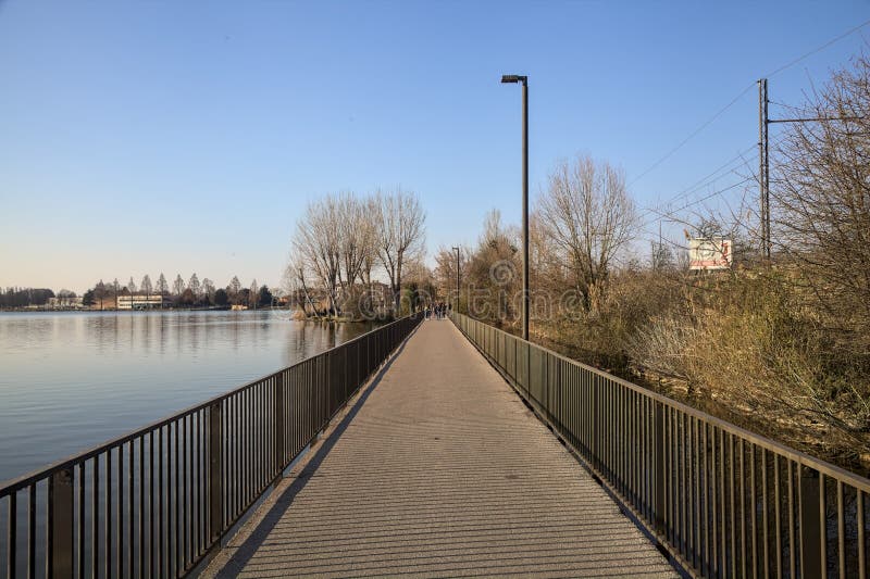 Bridge on a Lake in a Park with People Walking on a Sunny Day Stock ...