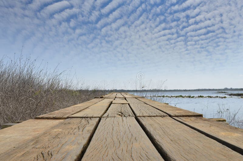 A Bridge into the Lake Under Blue Sky Stock Photo - Image of outdoor ...