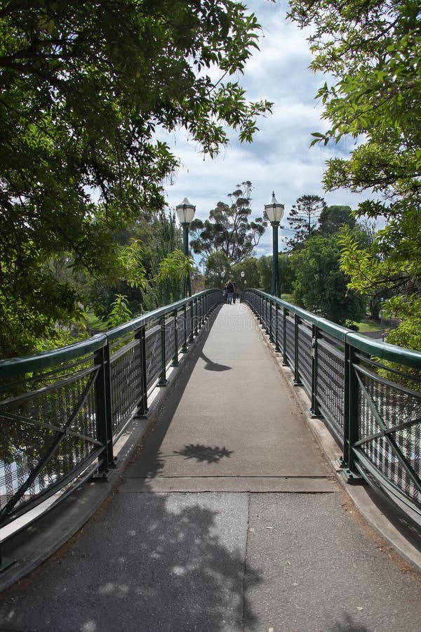 Bridge with Lanterns in a City Park Surrounded by Green Trees Stock ...