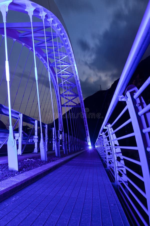 Bridge lighted in purple stock image. Image of night - 19950309