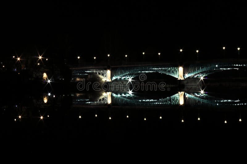 The Bridge Lights Reflected in Water Stock Photo - Image of water ...