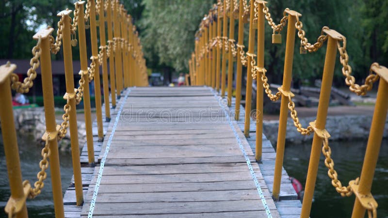 Bridge with Locks in the Park Across the Pond Stock Photo - Image of ...