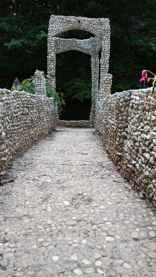 A Man Made Red Rock Waterfalls Stock Photo - Image of bank, colors ...