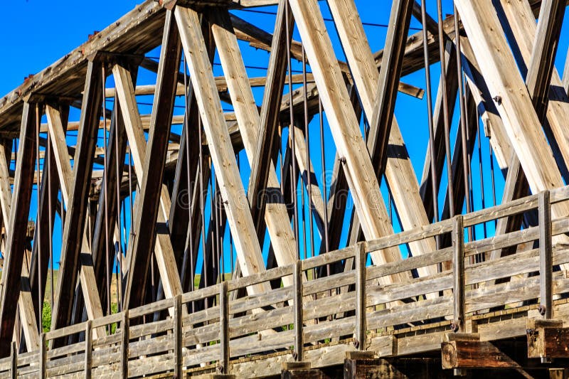 A Bridge Made of Wood with a Blue Sky in the Background Stock Photo ...