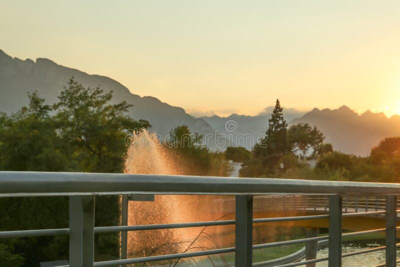 Bridge with Metal Handrails in Park at Sunset Stock Image - Image of ...